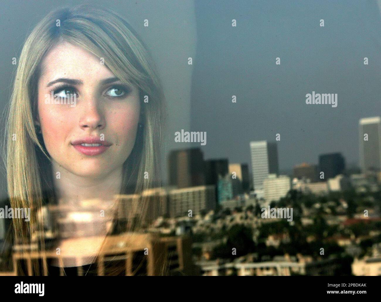 Actress Emma Roberts, star of the new movie "Nancy Drew," look out a ...