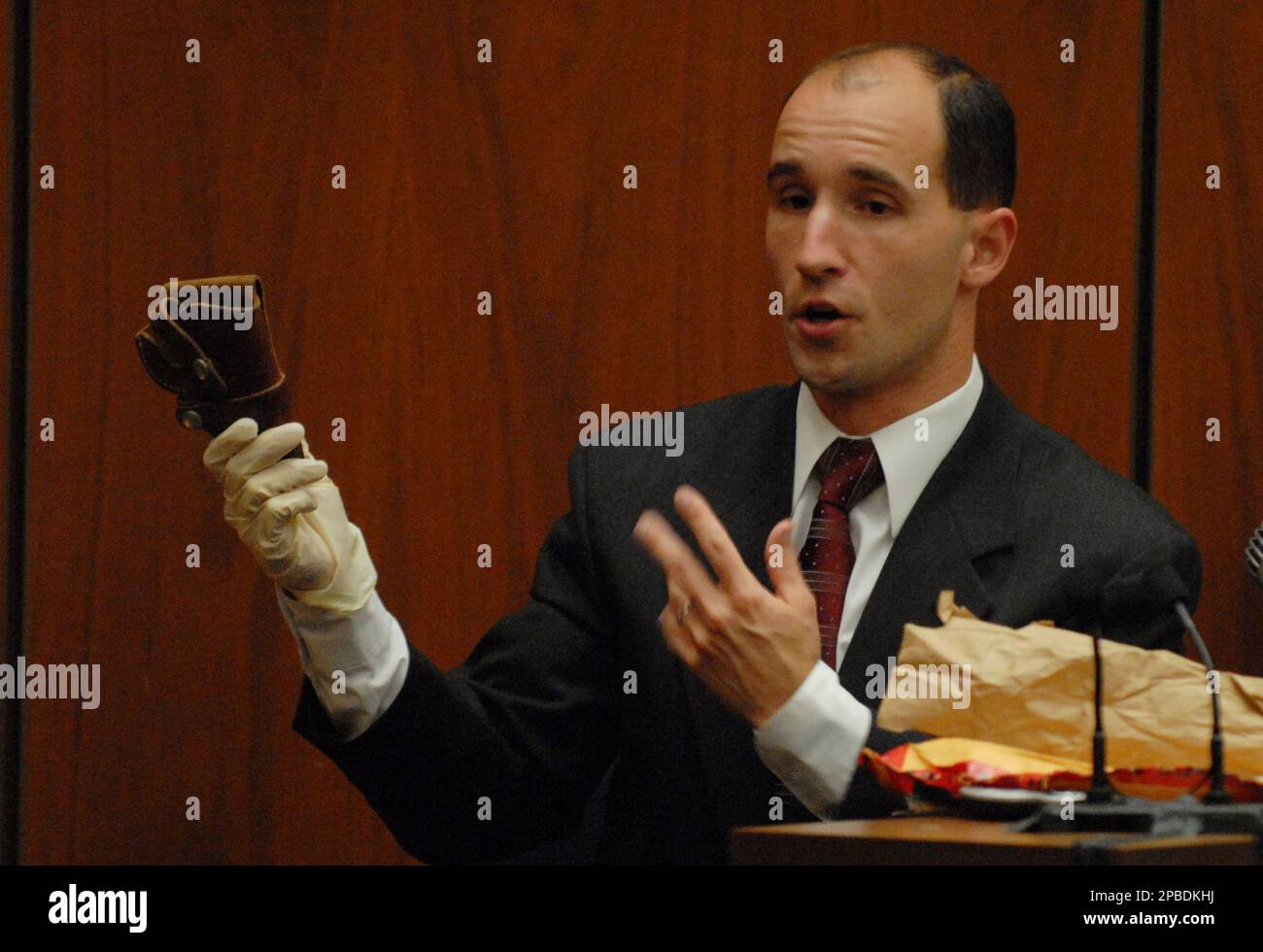Prosecution witness James Carroll, a criminologist for the Los Angeles ...