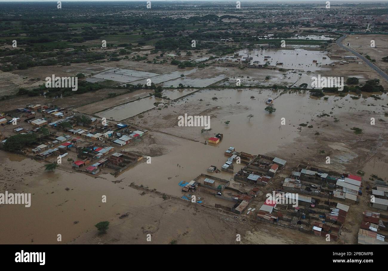 A neighborhood is flooded by the heavy rains of Cyclone Yaku, in ...