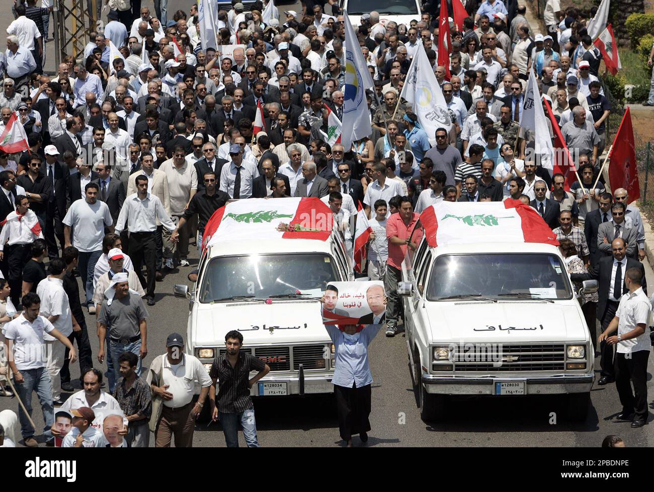 Relatives and friends of slain anti-syrian lawmaker Walid Eido and his ...