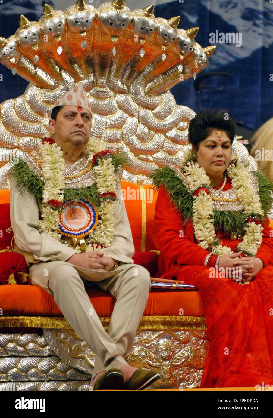 ** FILE ** Nepal's King Gyanendra, left, and Queen Komal look on after ...