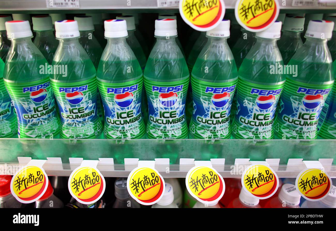 Bottles of Pepsi Ice Cucumber are on display at a convenience store in ...