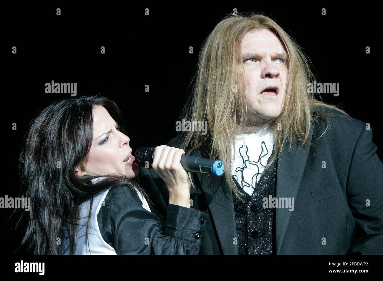 Rock star Meat Loaf, right, appears on stage with singer Marion Raven ...