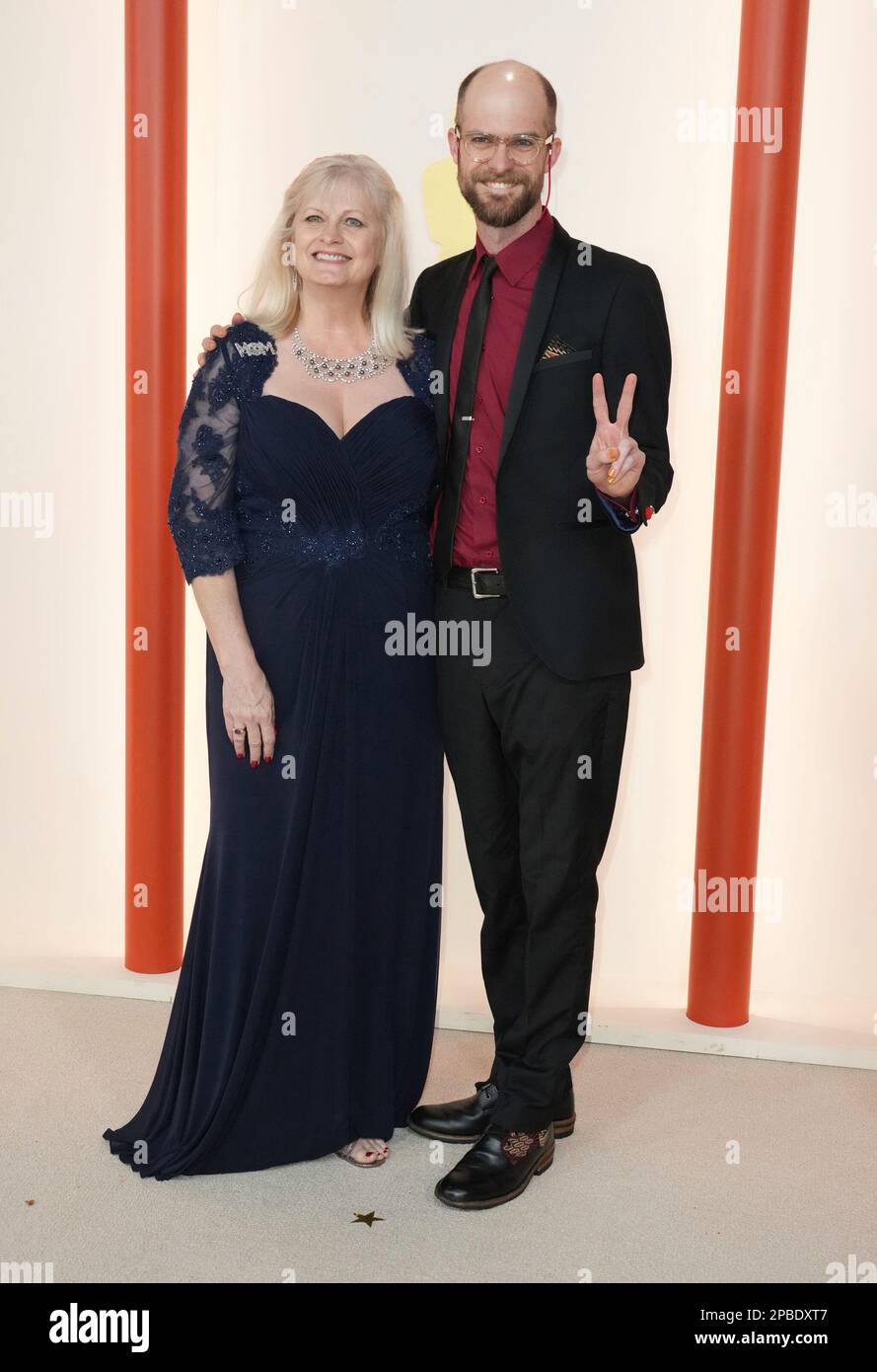 Becky Scheinert, left, and Daniel Scheinert arrives at the Oscars on ...