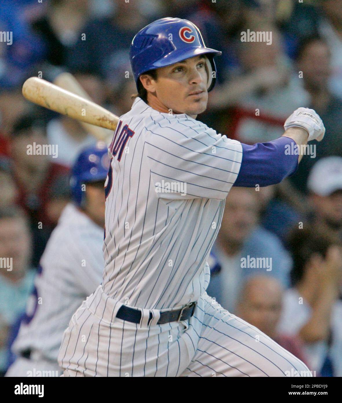 Chicago Cubs' Ryan Theriot hits an RBI single during the second inning ...
