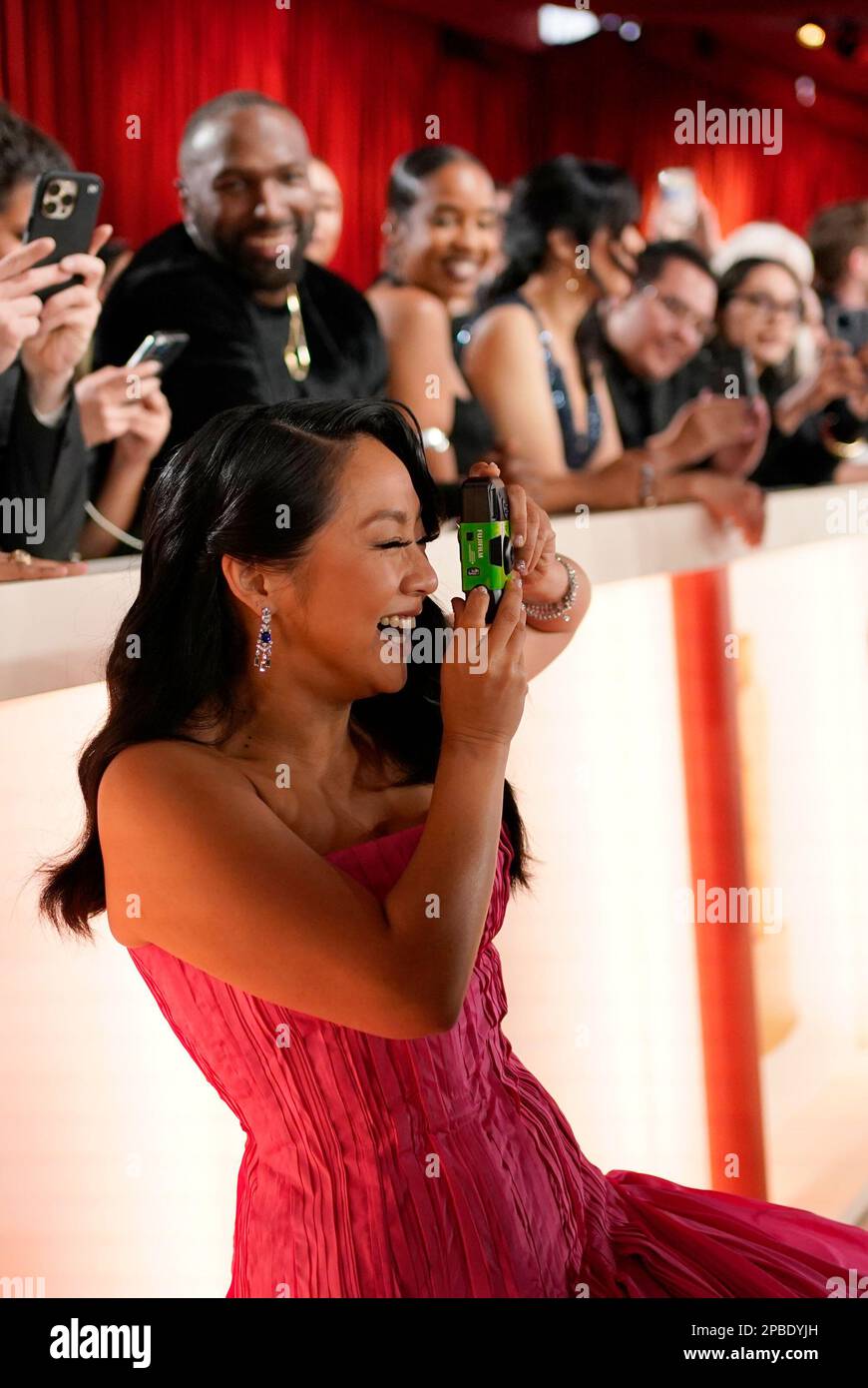 Stephanie Hsu arrives at the Oscars on Sunday, March 12, 2023, at the ...