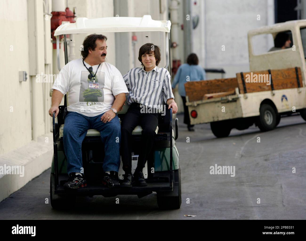 Vincent Martella, right, rides with his father Michael to the set of ...