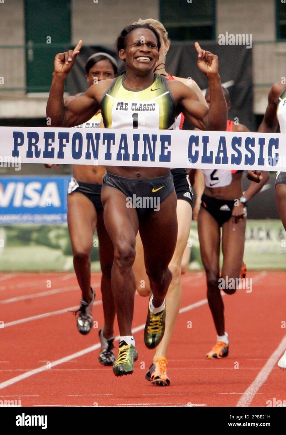 Maria Mutola, from Mozambique, wins the women's 800 meter race with a ...