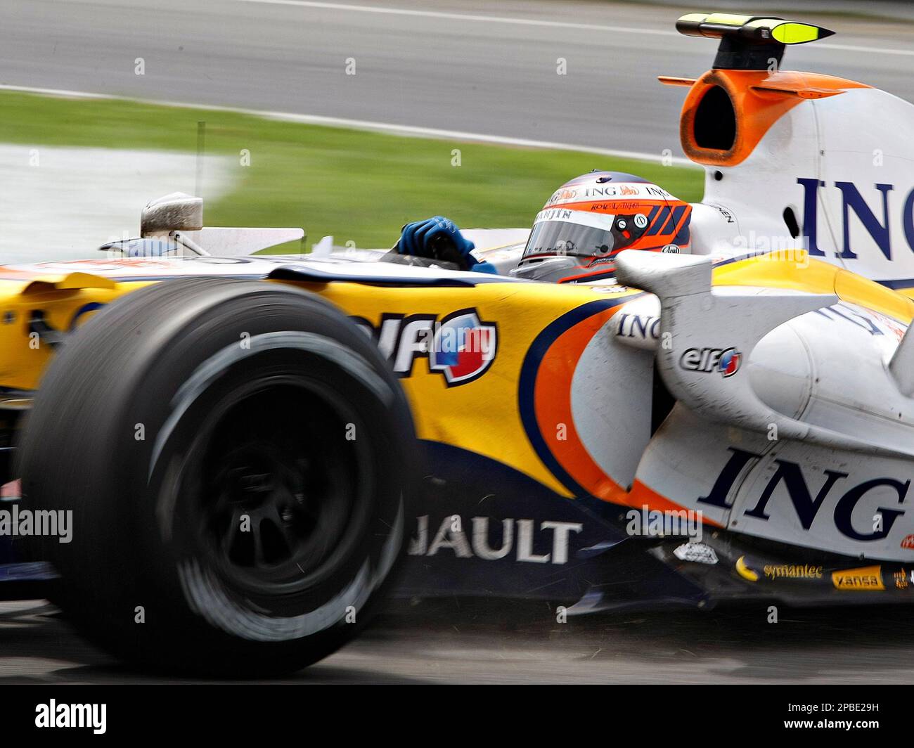 Formula One driver Heikki Kovalainen, of Finland, drives his Renault to ...