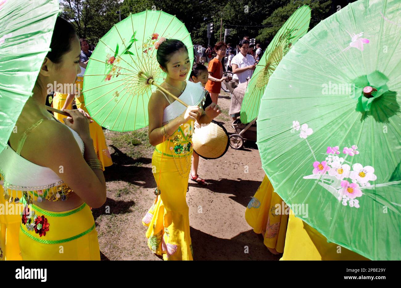 Helen Li, 13, of Wayland, Mass., center, waits to perform traditional a ...