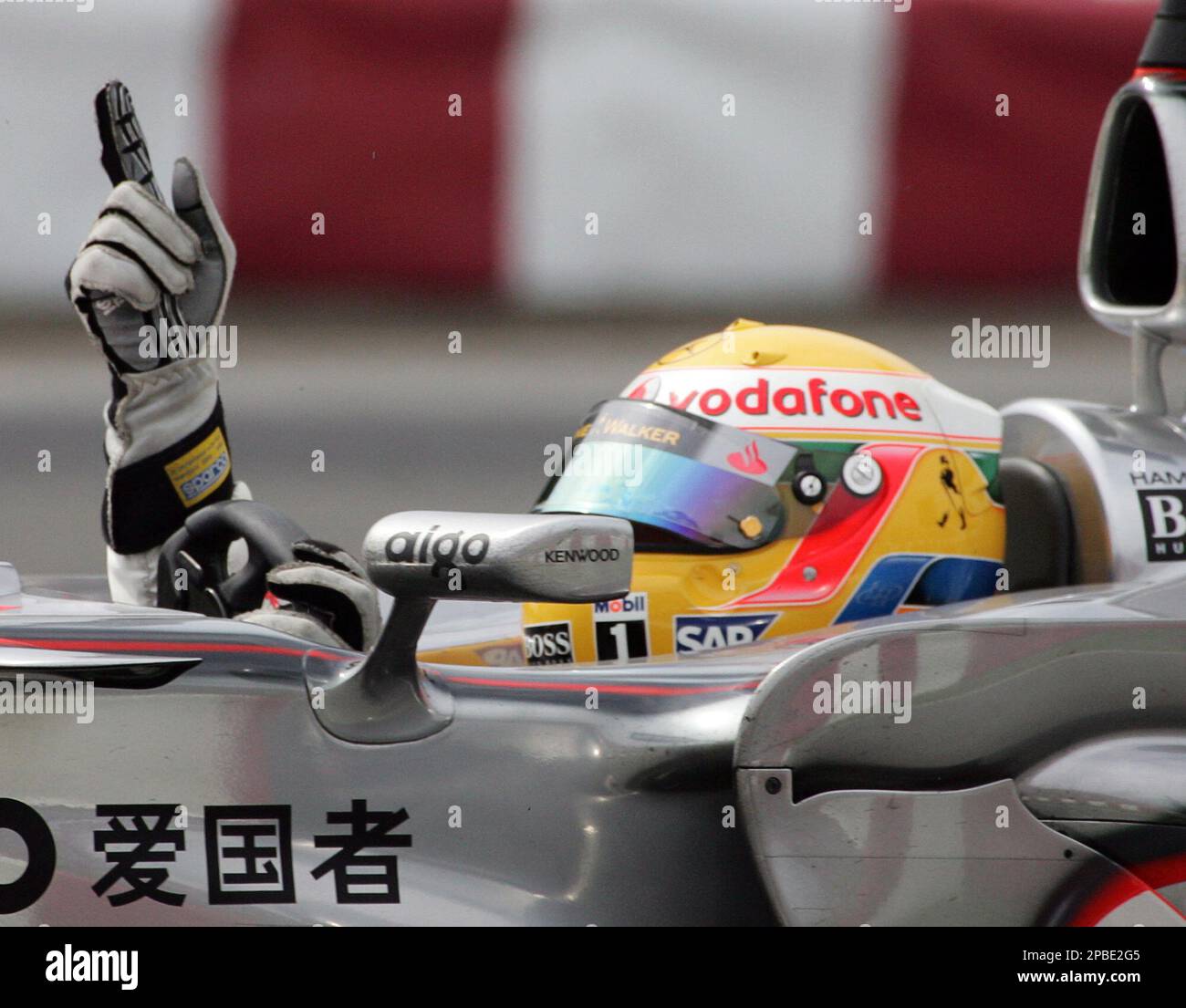 Mclaren Formula One driver Lewis Hamilton, from Britain, celebrates ...
