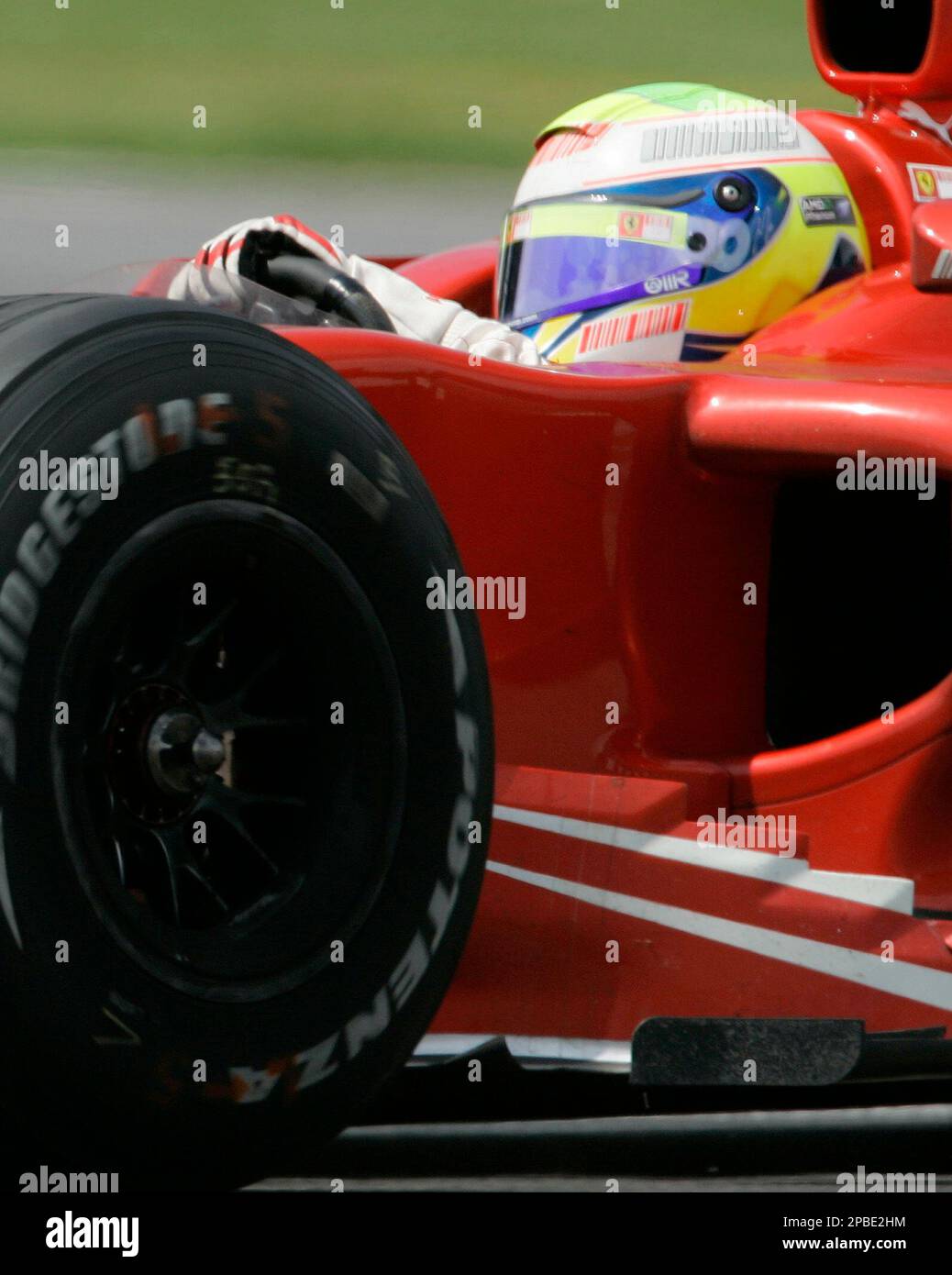 Ferrari Formula One driver Felipe Massa, of Brazil, steers his car ...