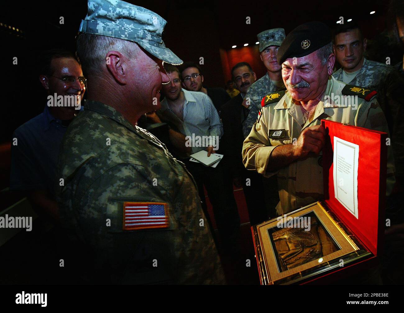 Lt. Gen. Martin E. Dempsey receives a gift from an Iraqi army commander ...