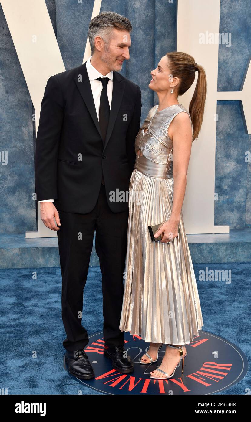 David Benioff, left, and Amanda Peet arrive at the Vanity Fair Oscar ...