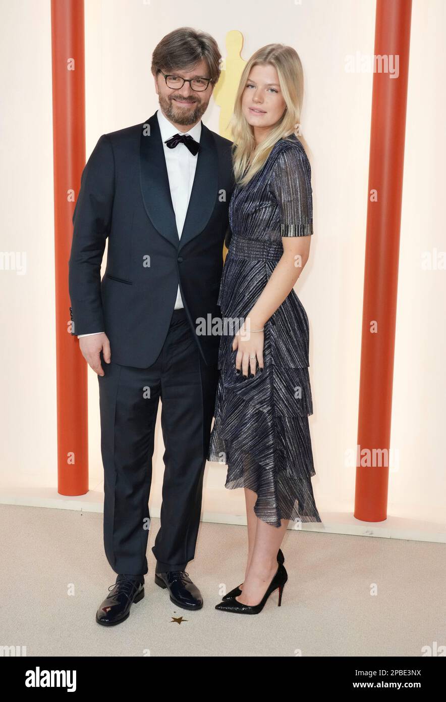 Florian Hoffmeister, left, and Liv Hoffmeister arrive at the Oscars on Sunday, March 12, 2023 ...