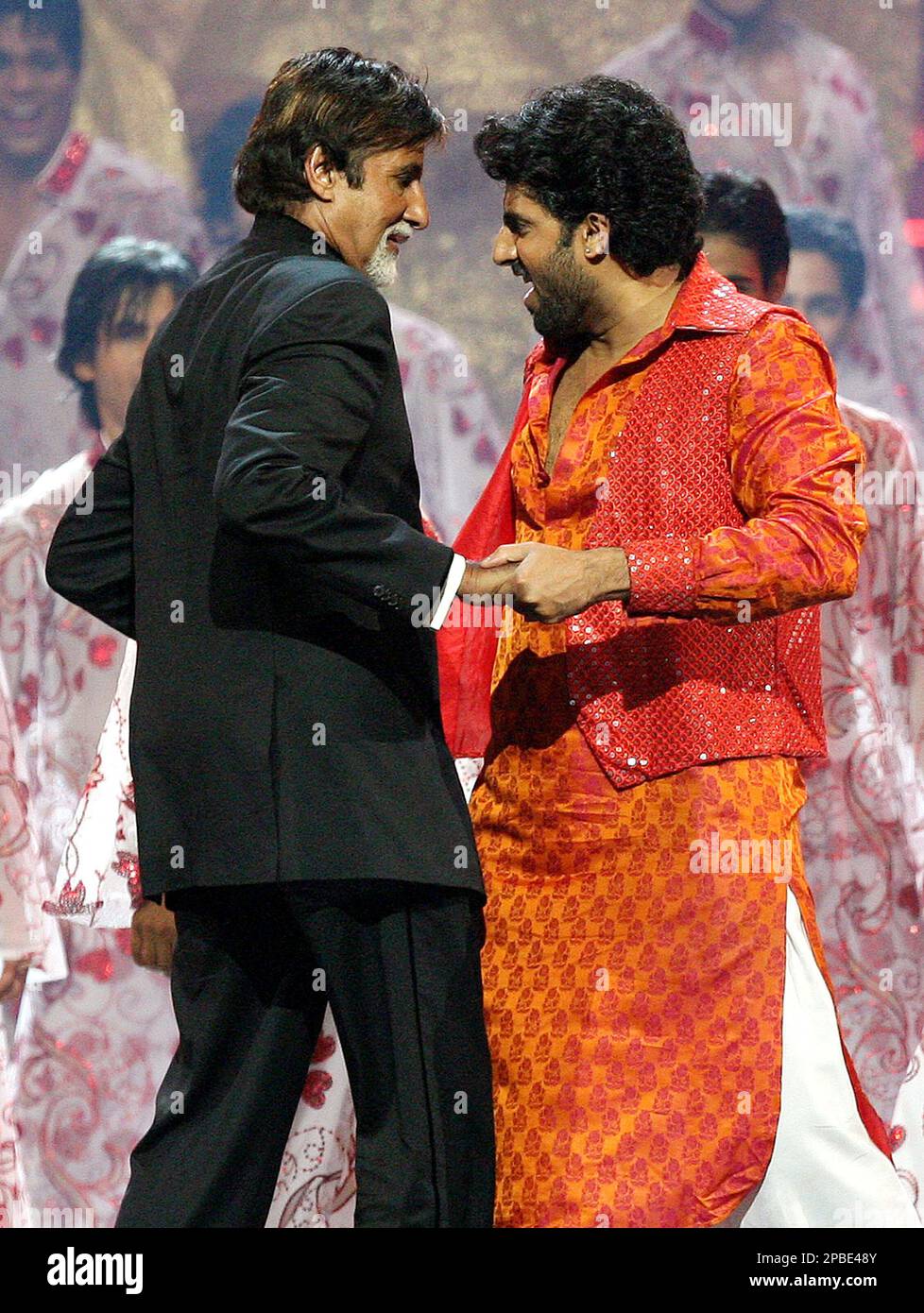 Bollywood stars Amitabh Bachchan, left, and his son Abhishek Bachchan ...