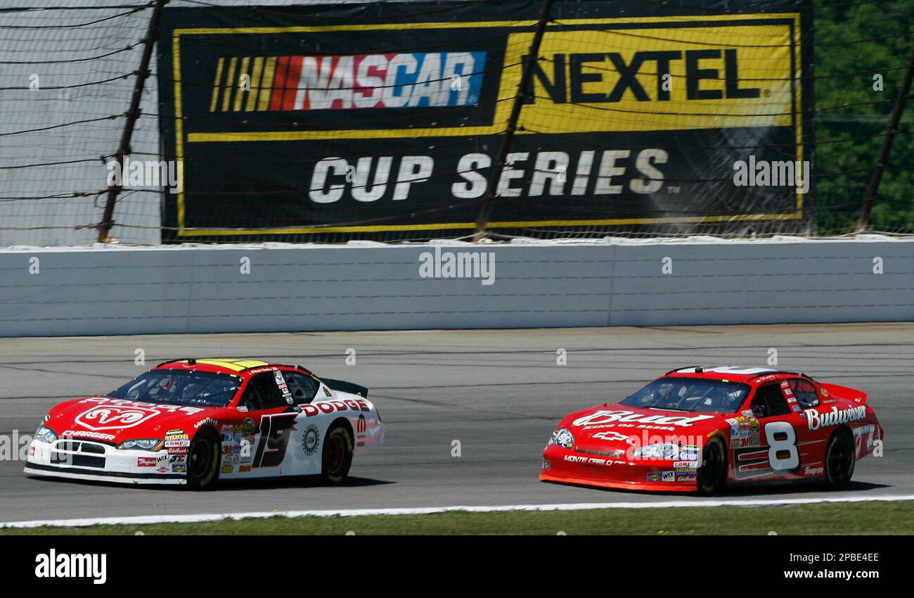 Elliott Sadler (19) and Dale Earnhardt Jr. (8) round turn three during ...