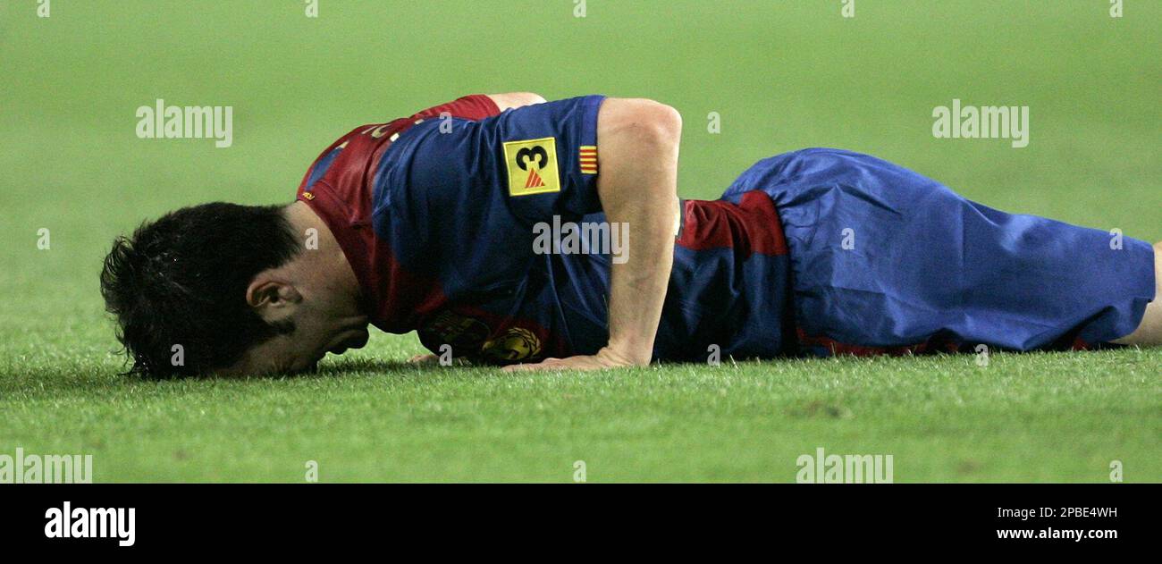 Barcelona's Andres Iniesta lies on the ground during a Spanish league ...