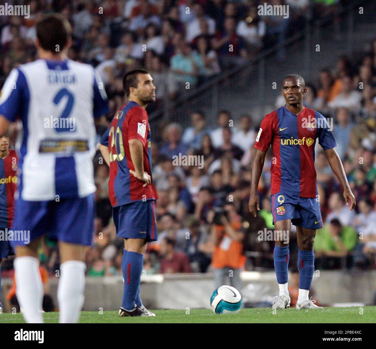 FC Barcelona player Samuel Etoo, right, and Deco, second right, react ...