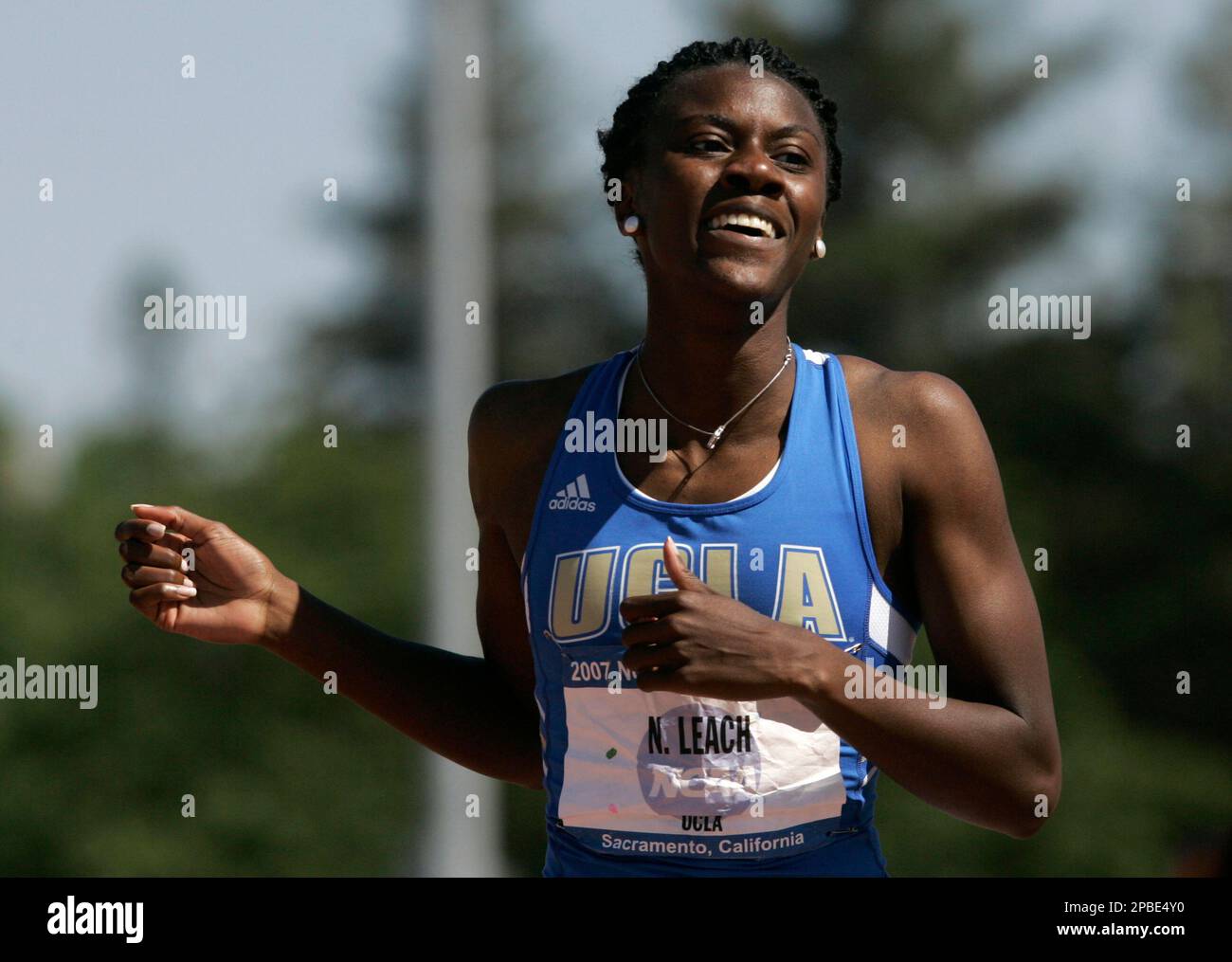 UCLA's Nicole Leach smiles after winning the women's 400-meter hurdles ...