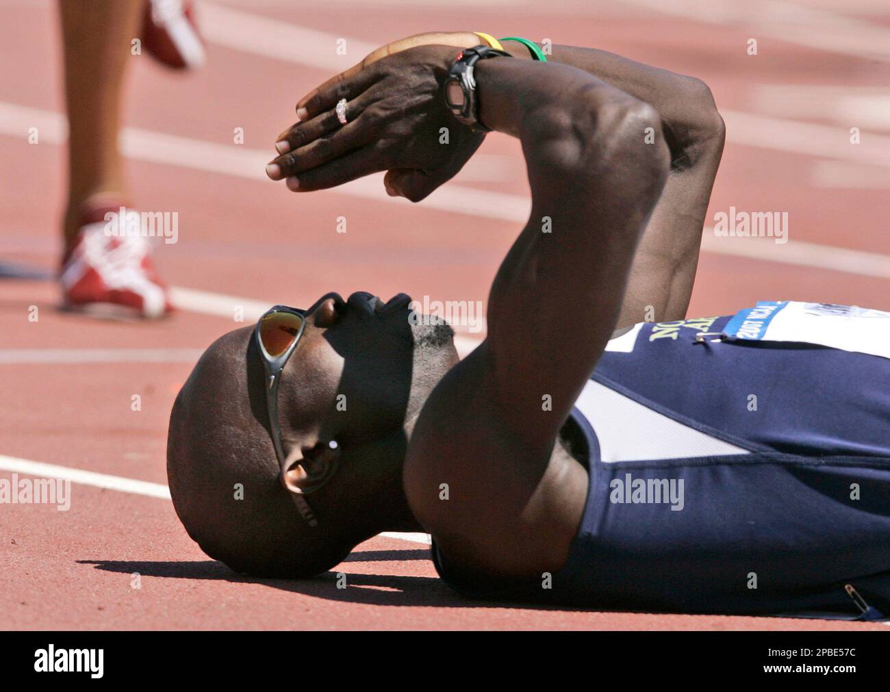 Northern Arizona's Lopez Lomong celebrates after winning the men's ...