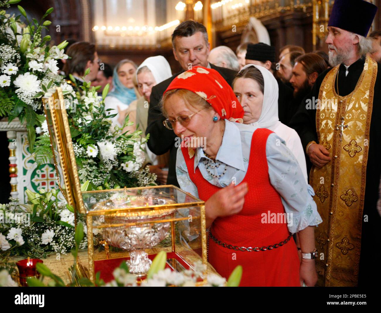 Russian Orthodox believers line up to kiss holy relics from Greece's ...