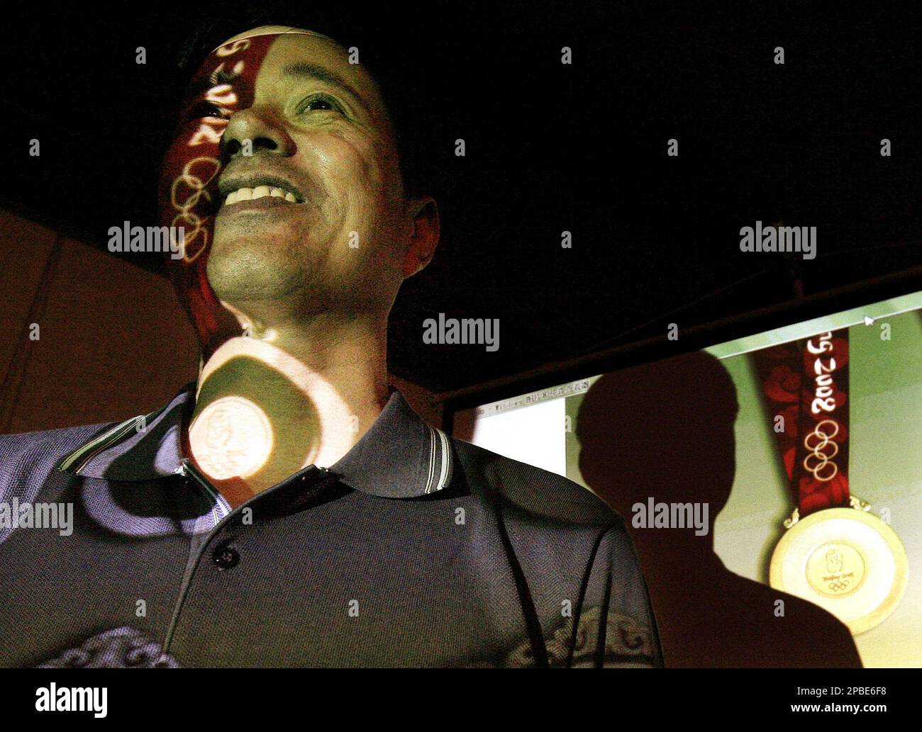 Wang Yipeng, designer of the award medals of the 2008 Beijing Olympic ...