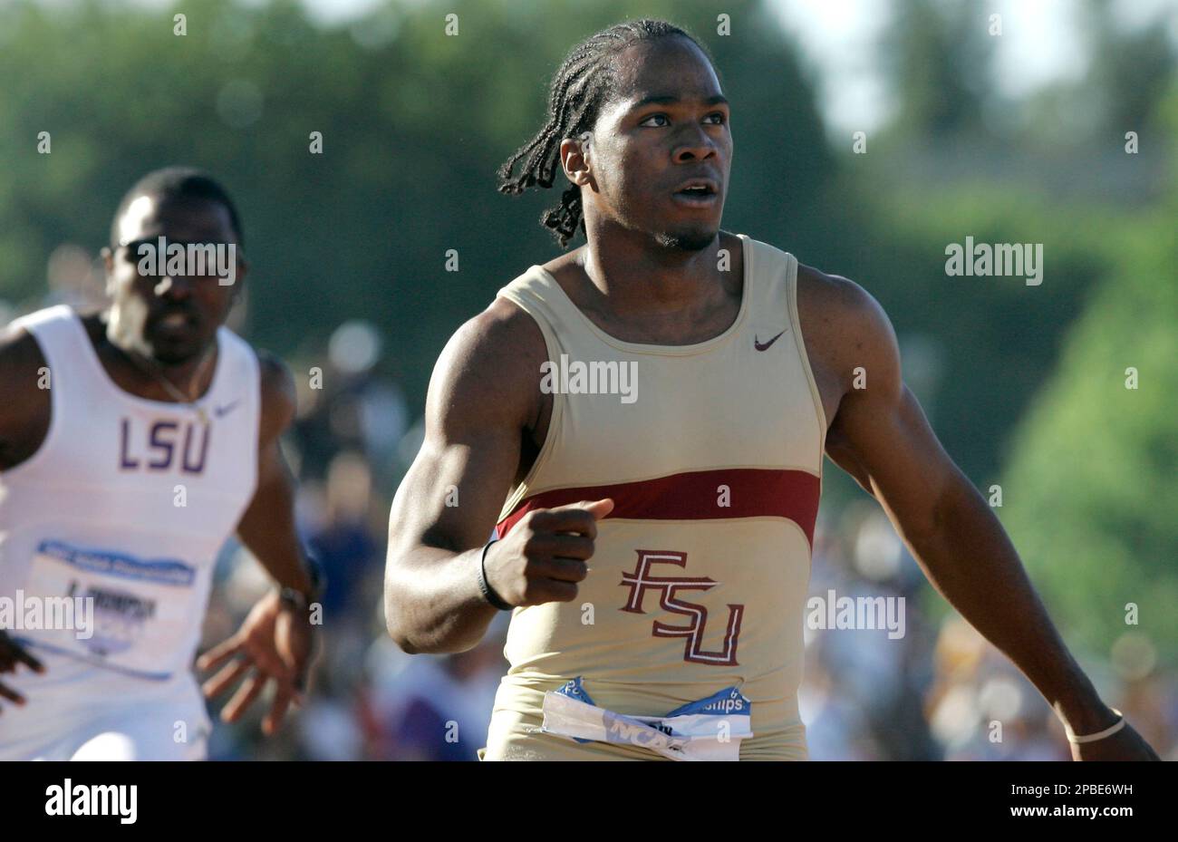 Florida State's Walter Dix, right, looks at the scoreboard after ...