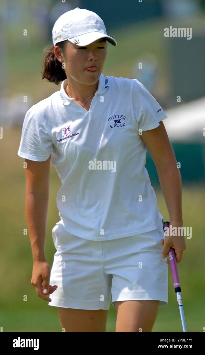 Angela Park, of Brazil, reacts to a putt on the ninth hole Friday, June ...