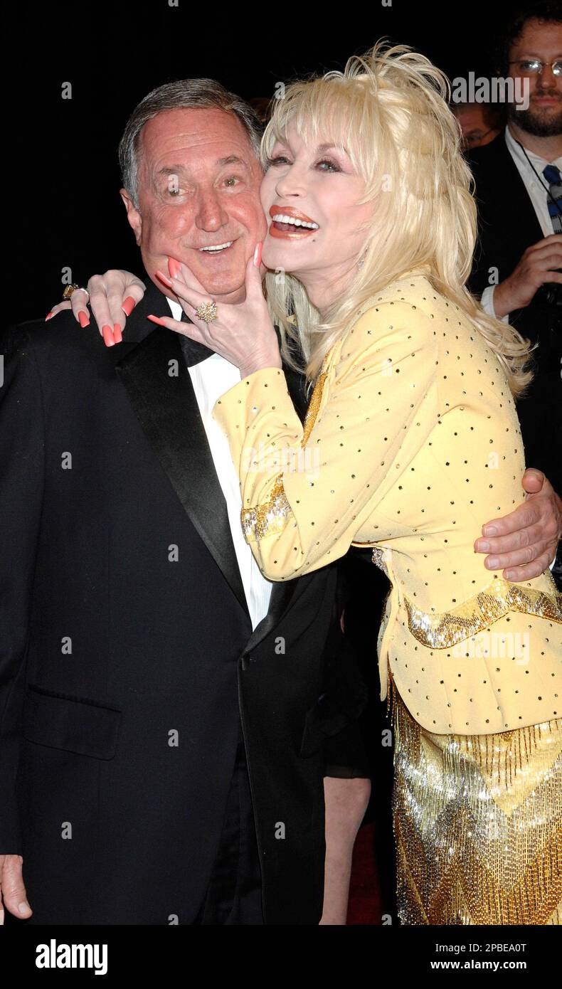 Dolly Parton and Neil Sedaka react as they arrive for the 2007 ...