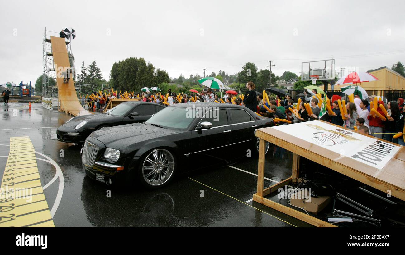 Squatch, the Seattle SuperSonics mascot, makes a ramp jump on in-line ...