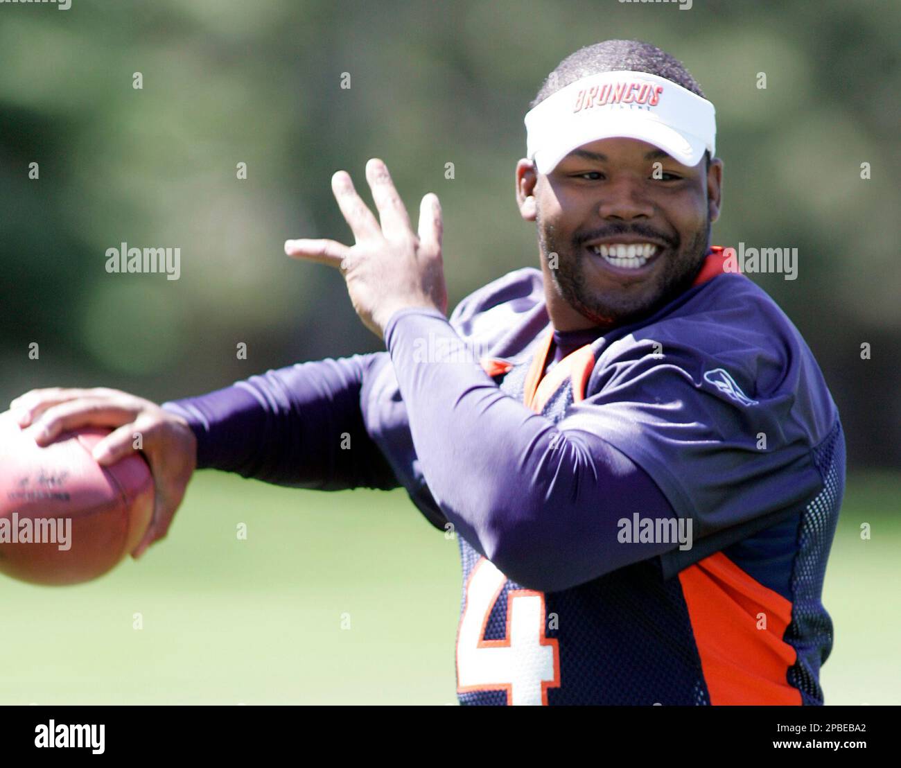 Denver Broncos quarterback Darrell Hackney looks to throw during the ...