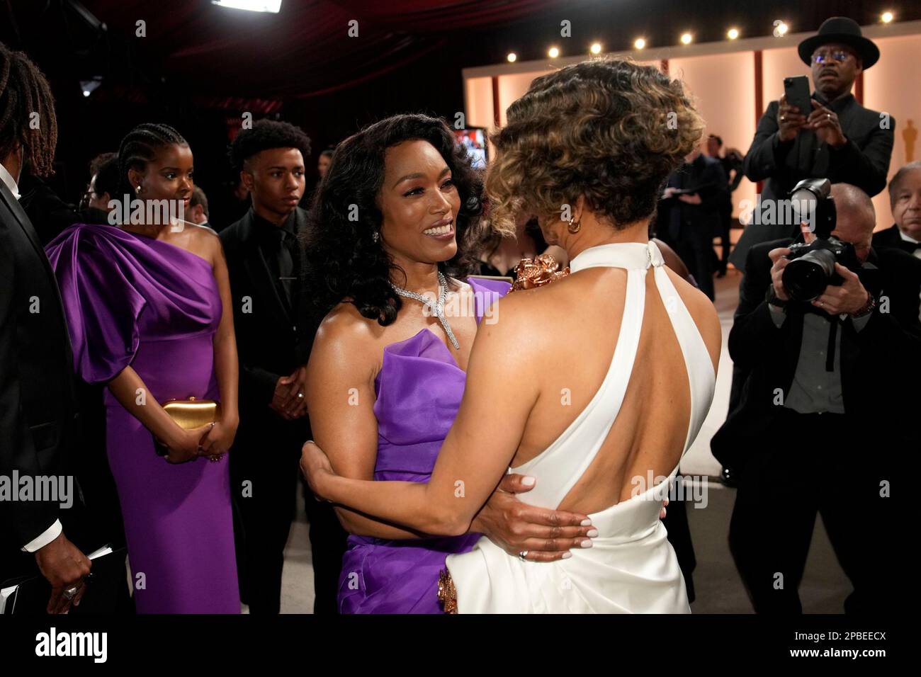 Angela Bassett, left, and Halle Berry arrive at the Oscars on Sunday ...