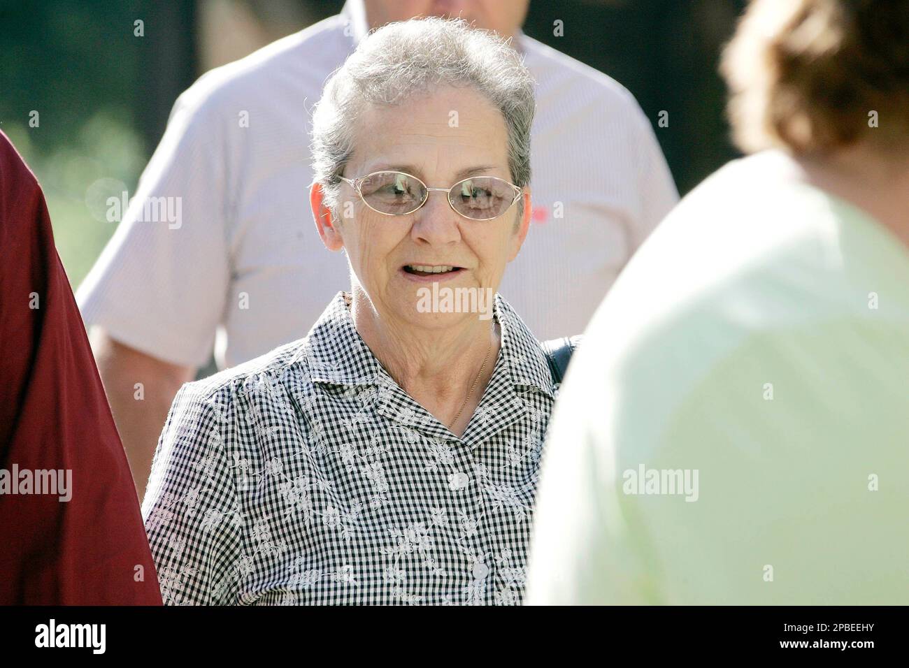 Surrounded by her supporters, Jean Seale, wife of reputed Ku Klux ...
