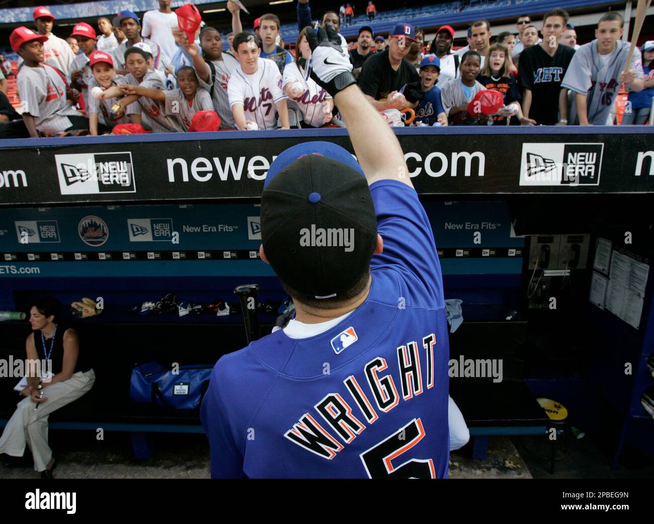 The New York Mets' David Wright signs autographs for fans before ...