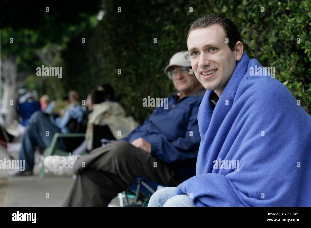 Fan Philip Barrett, from Tampa, Fla., who has been waiting in line ...