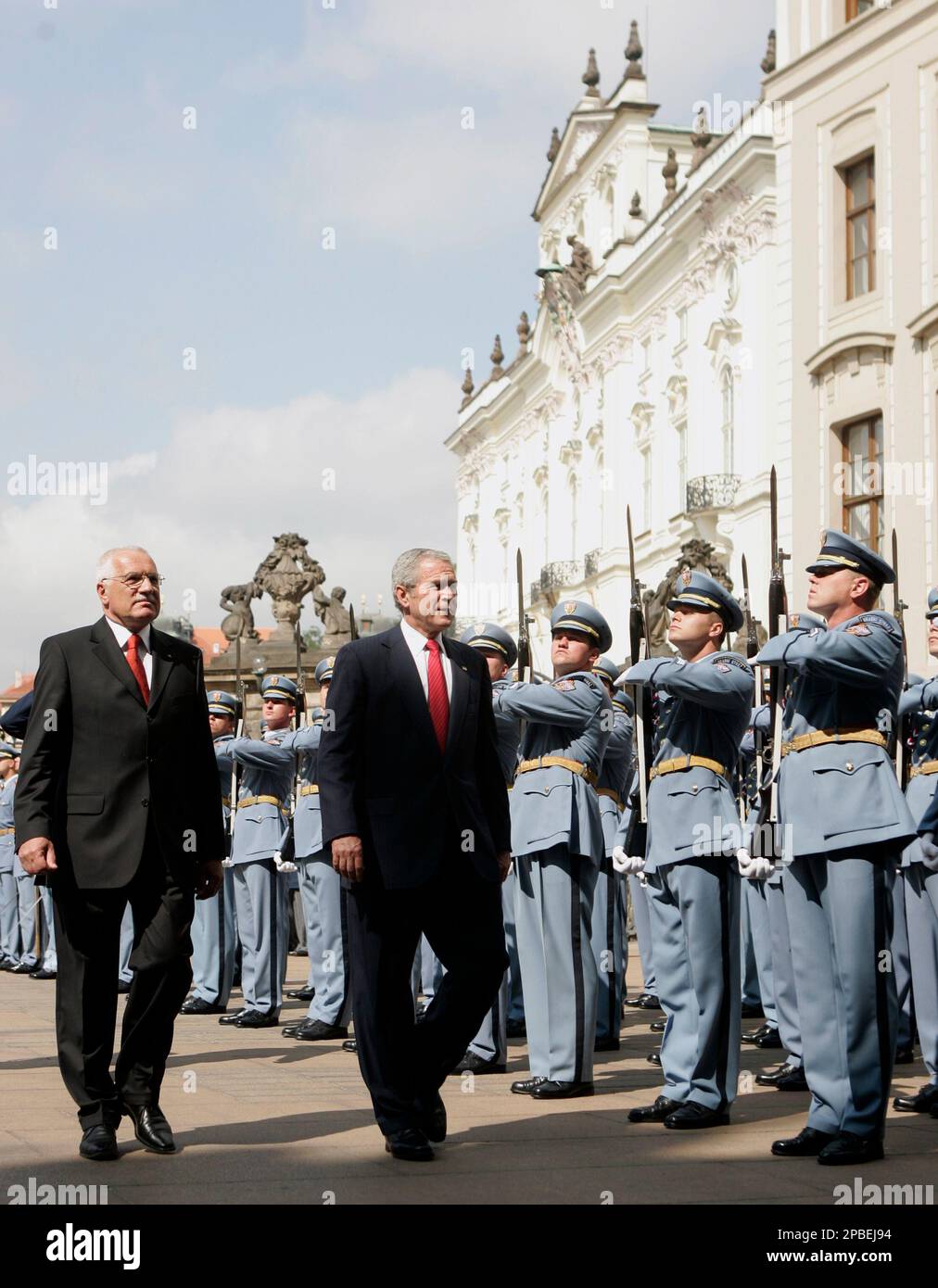 U.S. President George W. Bush walks with the President of the Czech ...
