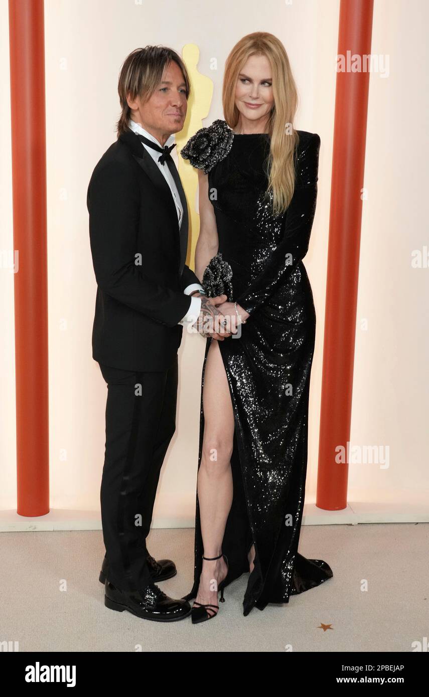 Keith Urban, left, and Nicole Kidman arrive at the Oscars on Sunday ...