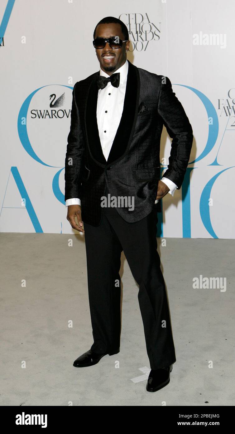 Sean Combs poses for a photo at the CFDA Fashion Awards in New York ...
