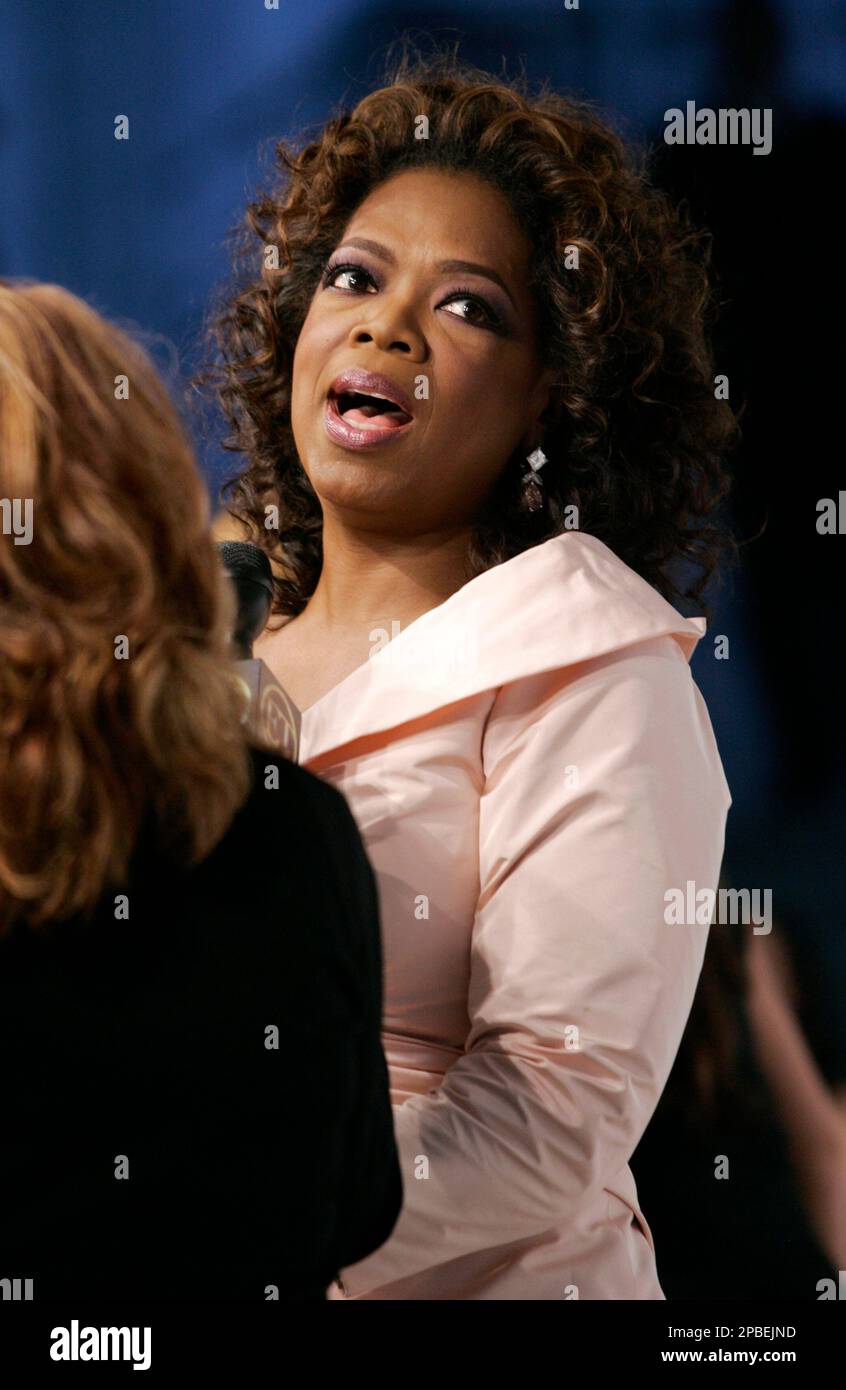 Oprah poses for a picture at the CFDA Fashion Awards in New York ...