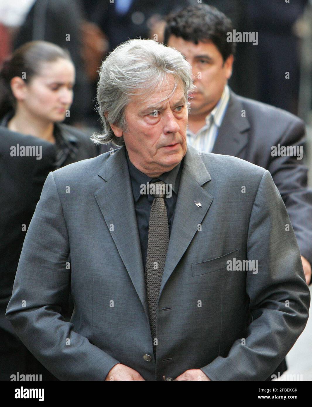 French actor Alain Delon leaves the Saint-Louis en l'Ile church after ...