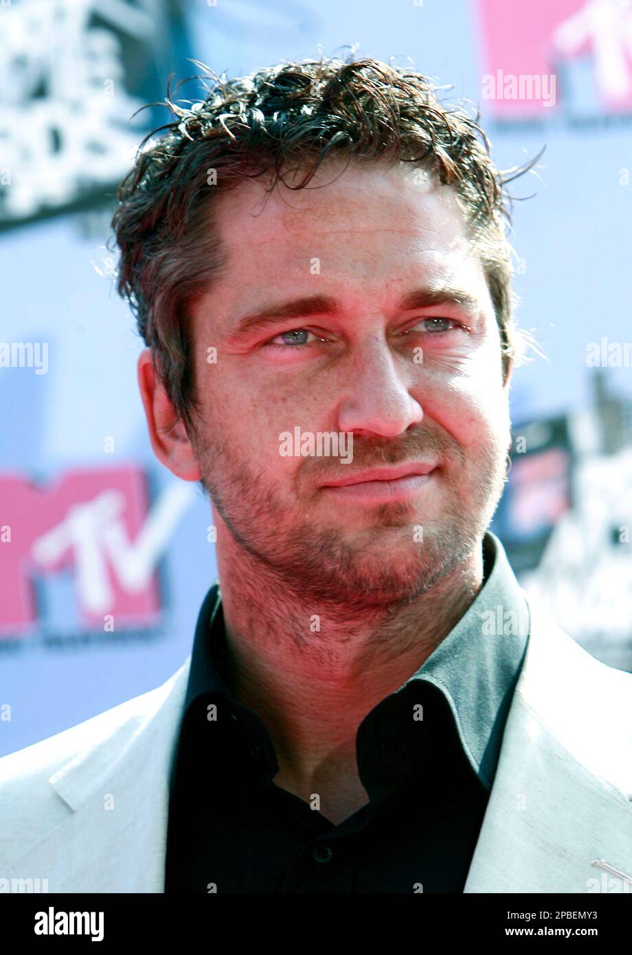Gerard Butler arrives at the MTV Movie Awards in Los Angeles on Sunday ...