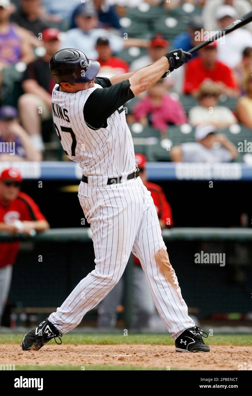 Colorado Rockies' Garrett Atkins follows through with his swing after ...