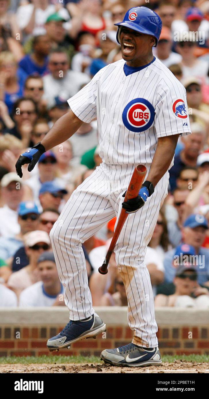 Chicago Cubs' Jacque Jones reacts after being called out on strikes ...