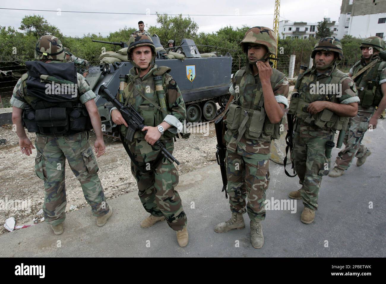 Lebanese army soldiers from navy commandos units, stand alert as they ...