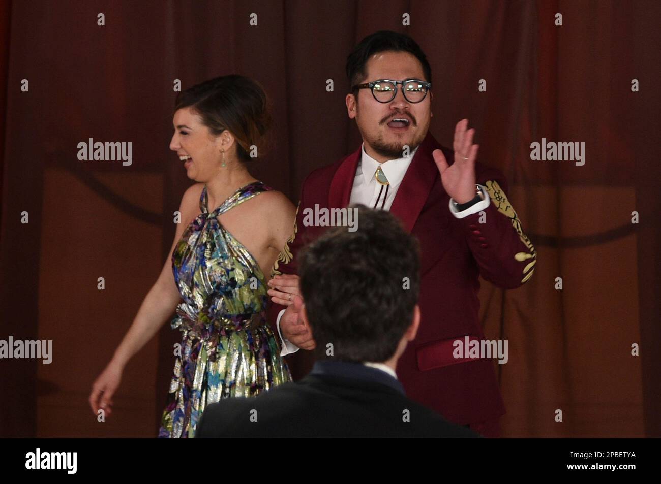 Kirsten Lepore, left, and Daniel Kwan arrive at the Oscars on Sunday ...