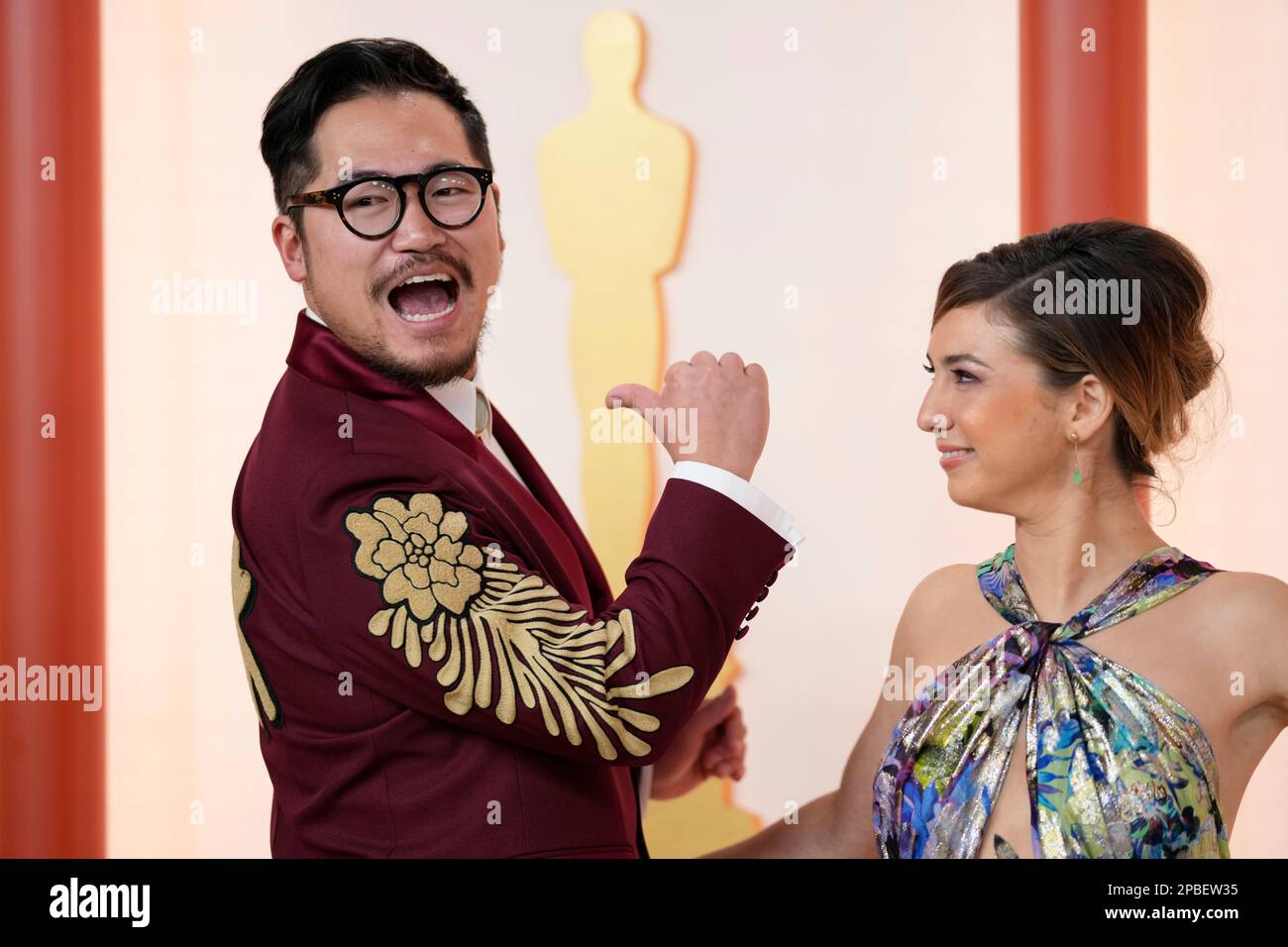 Daniel Kwan, left, and Kirsten Lepore arrive at the Oscars on Sunday ...