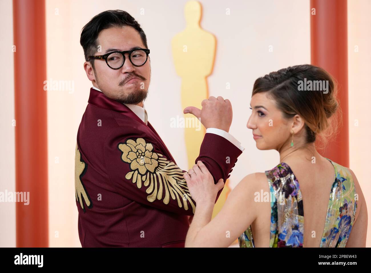 Daniel Kwan, left, and Kirsten Lepore arrive at the Oscars on Sunday ...