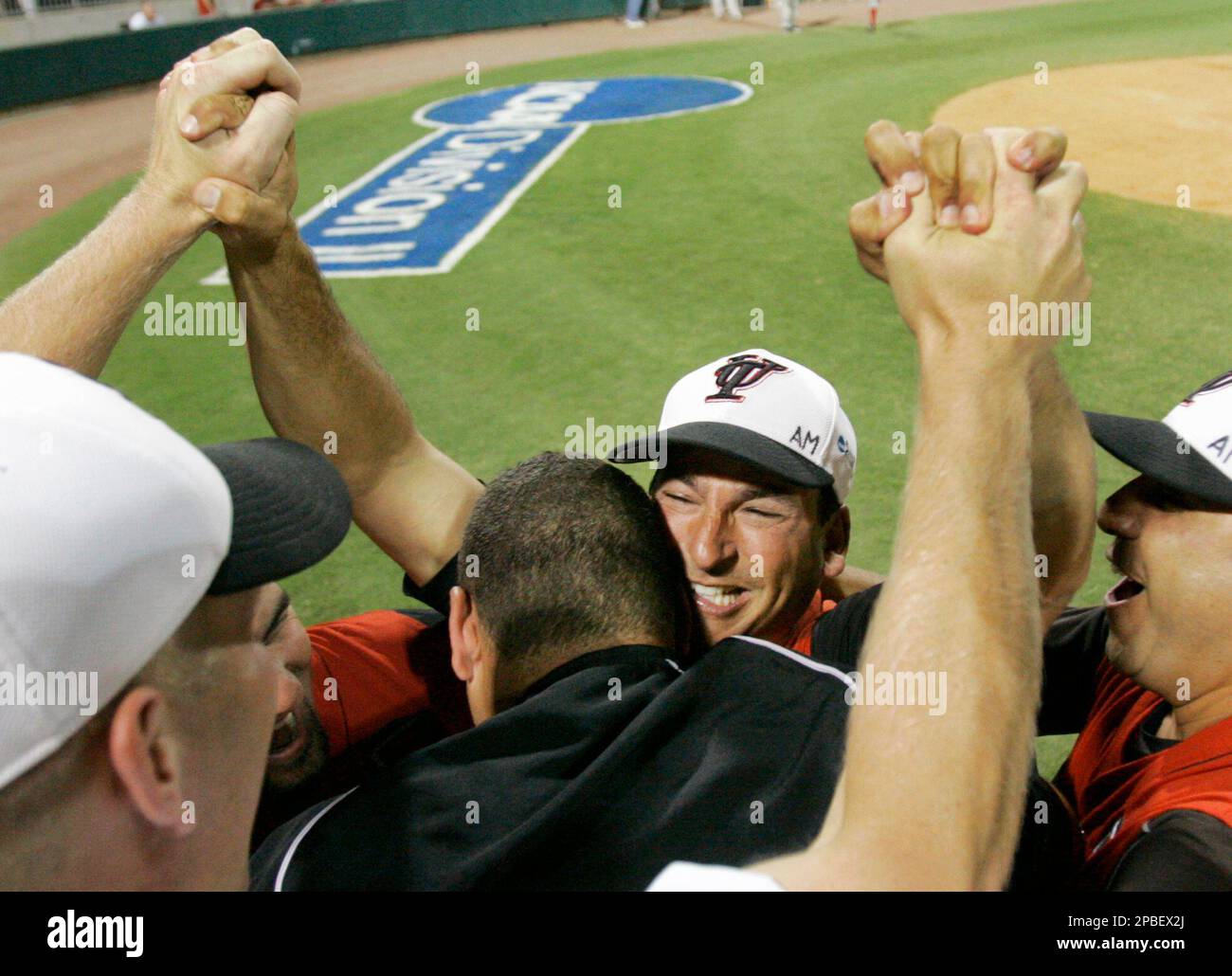 Tampa coach Joe Urso, facing camera, celebrates after Tampa defeated ...