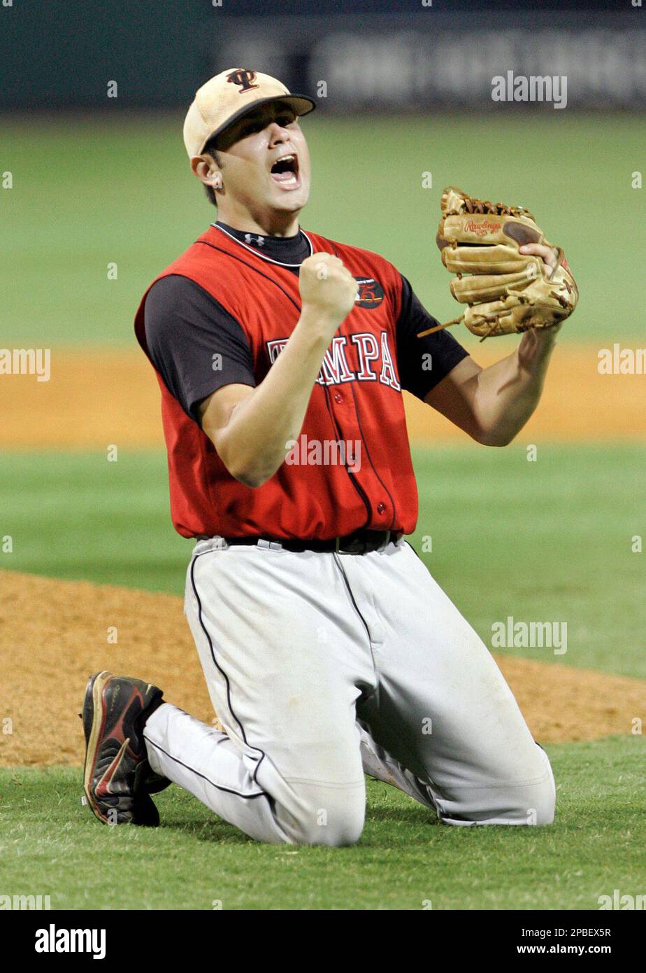 Tampa pitcher Jonathan Holt celebrates the last out against Columbus ...